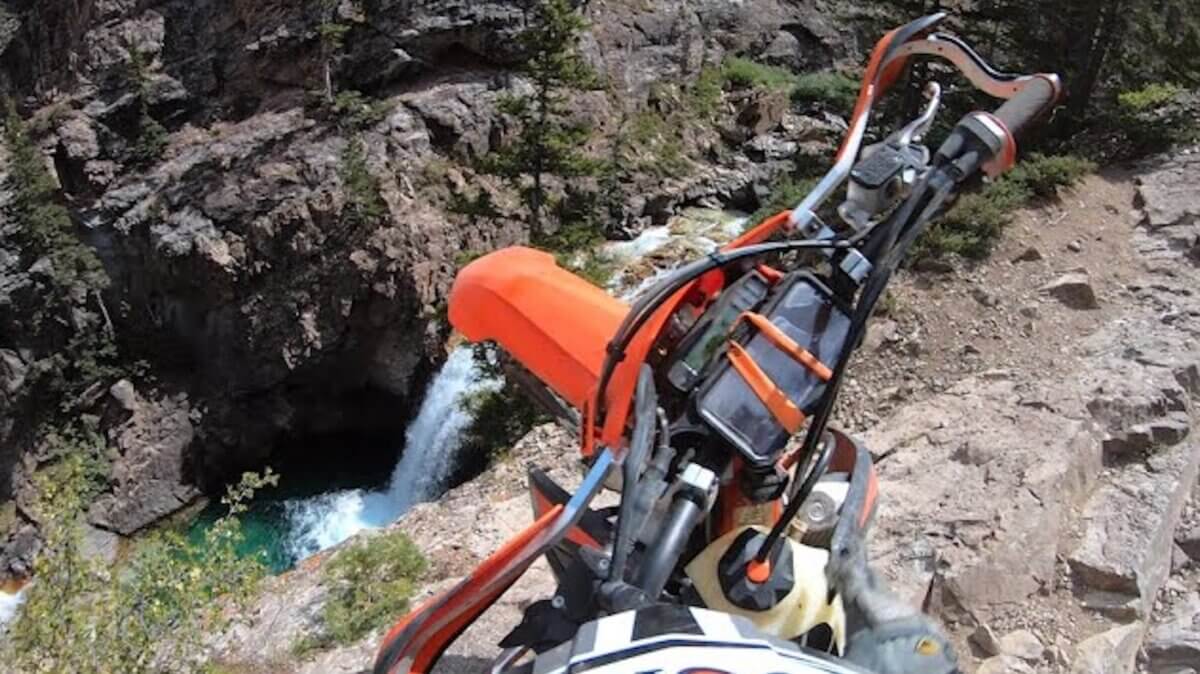 VIDEO: Colorado Dirt Biker Survives 70ft Drop Straight Off Cliff ...