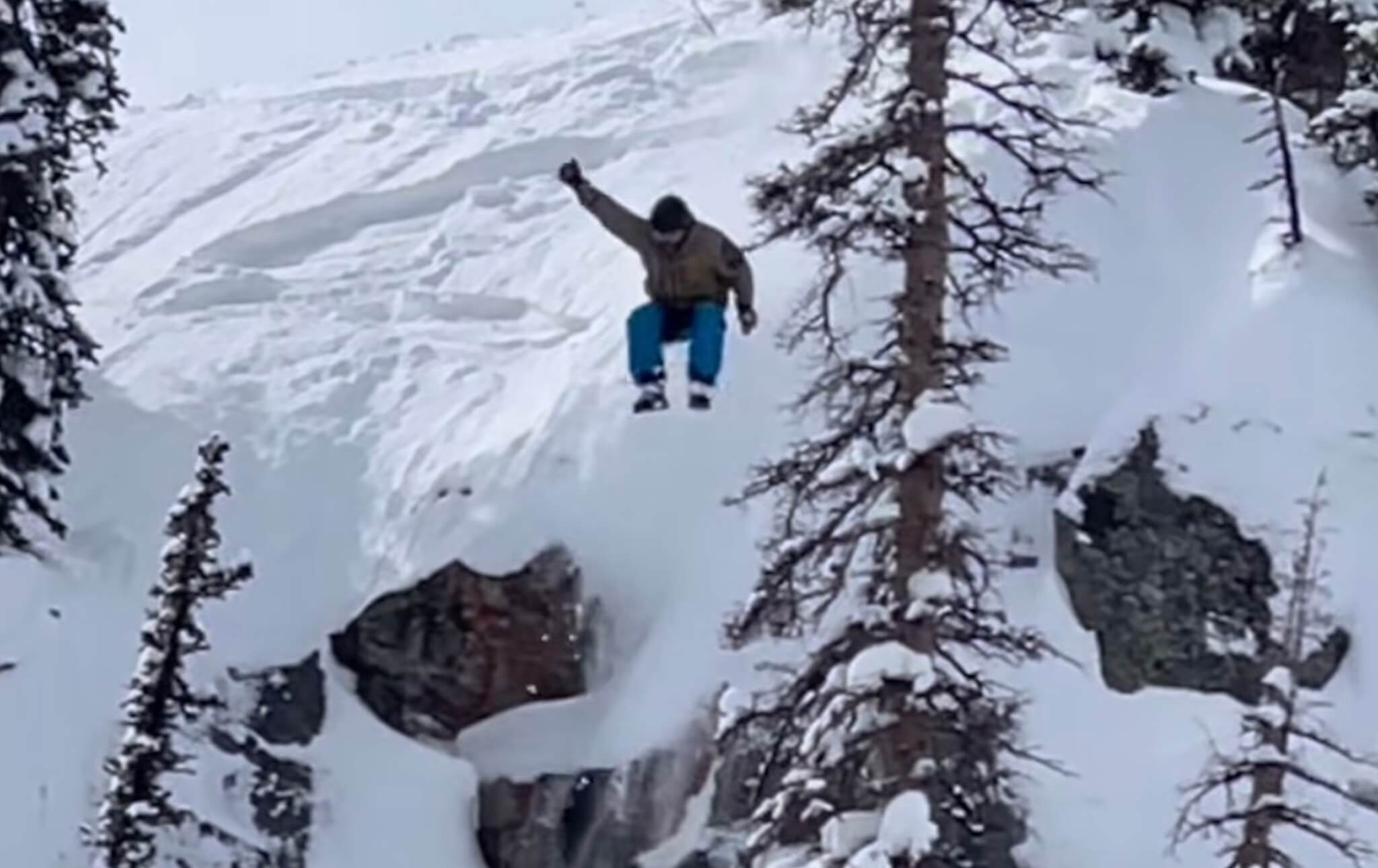 VIDEO: Snowboarder Loses Board At Top of Cliff, Sends It Anyway ...