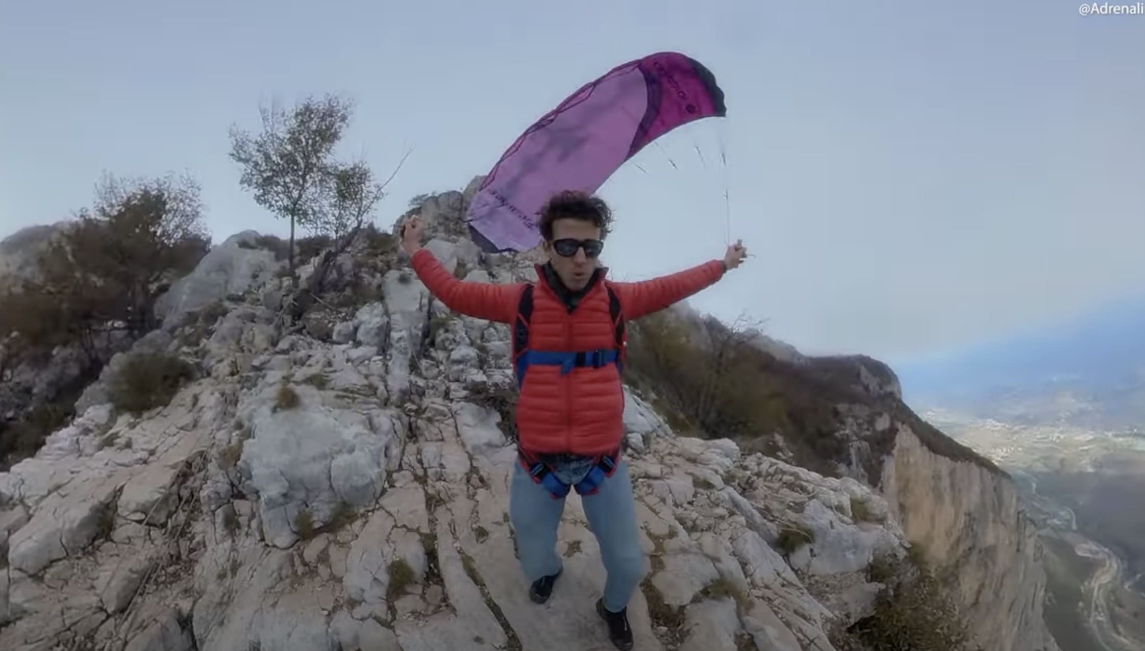 Watch: Guy Jumps Off Cliff With Comically Small Handheld Parachute ...