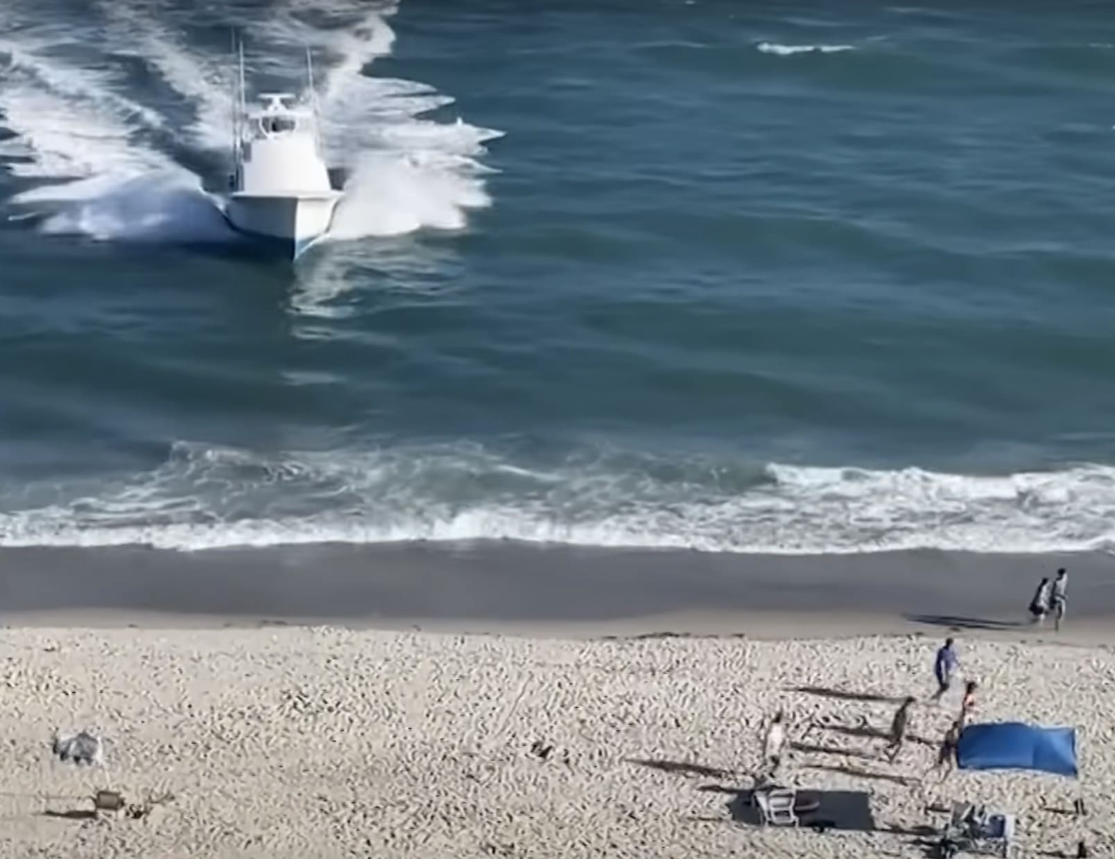 Beach Goers Flee As Fishing Boat Runs Aground in North Carolina (VIDEO ...
