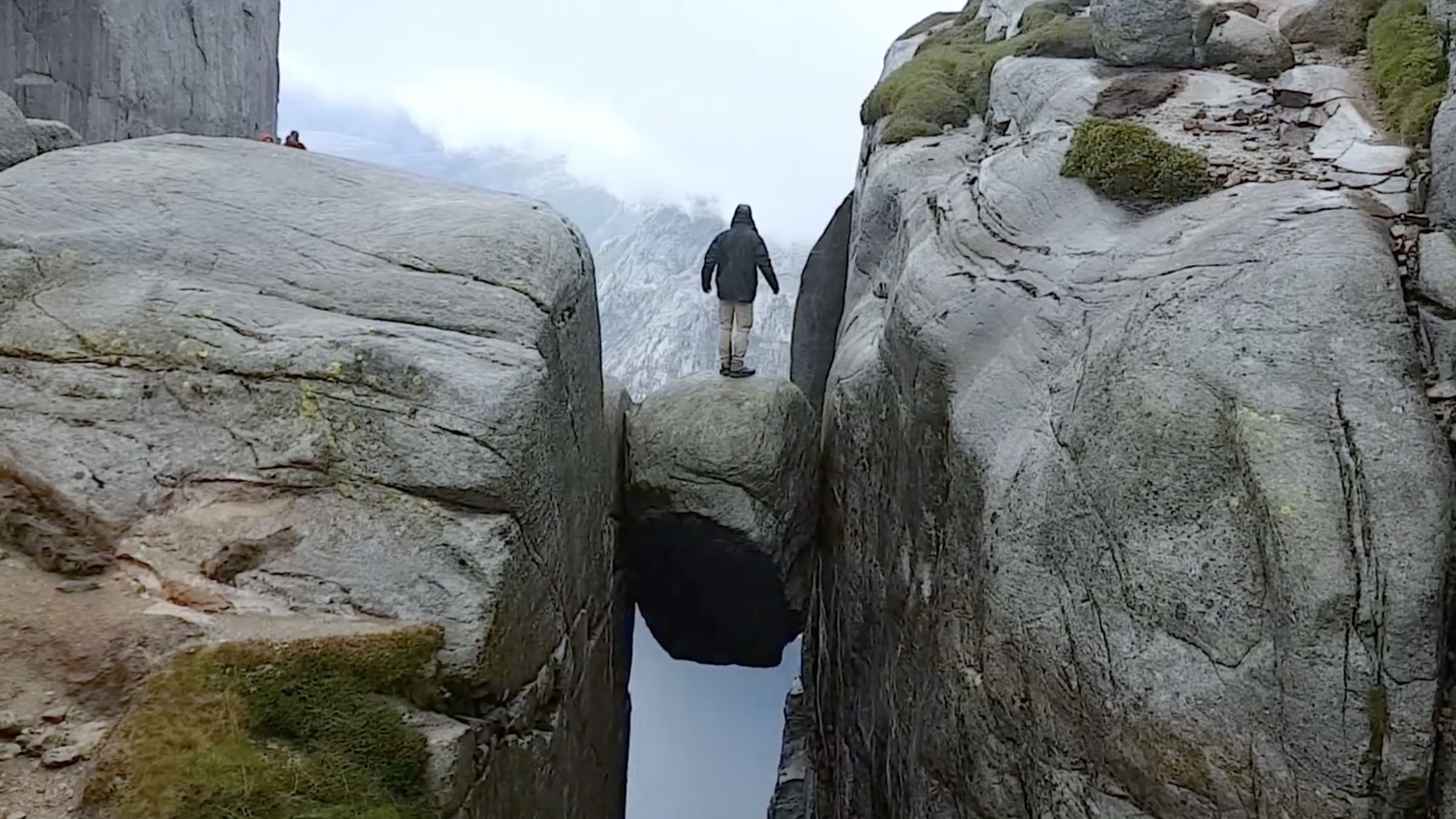 This Instagram Famous Boulder Is Suspended 3,000 Feet Above A Fjord ...