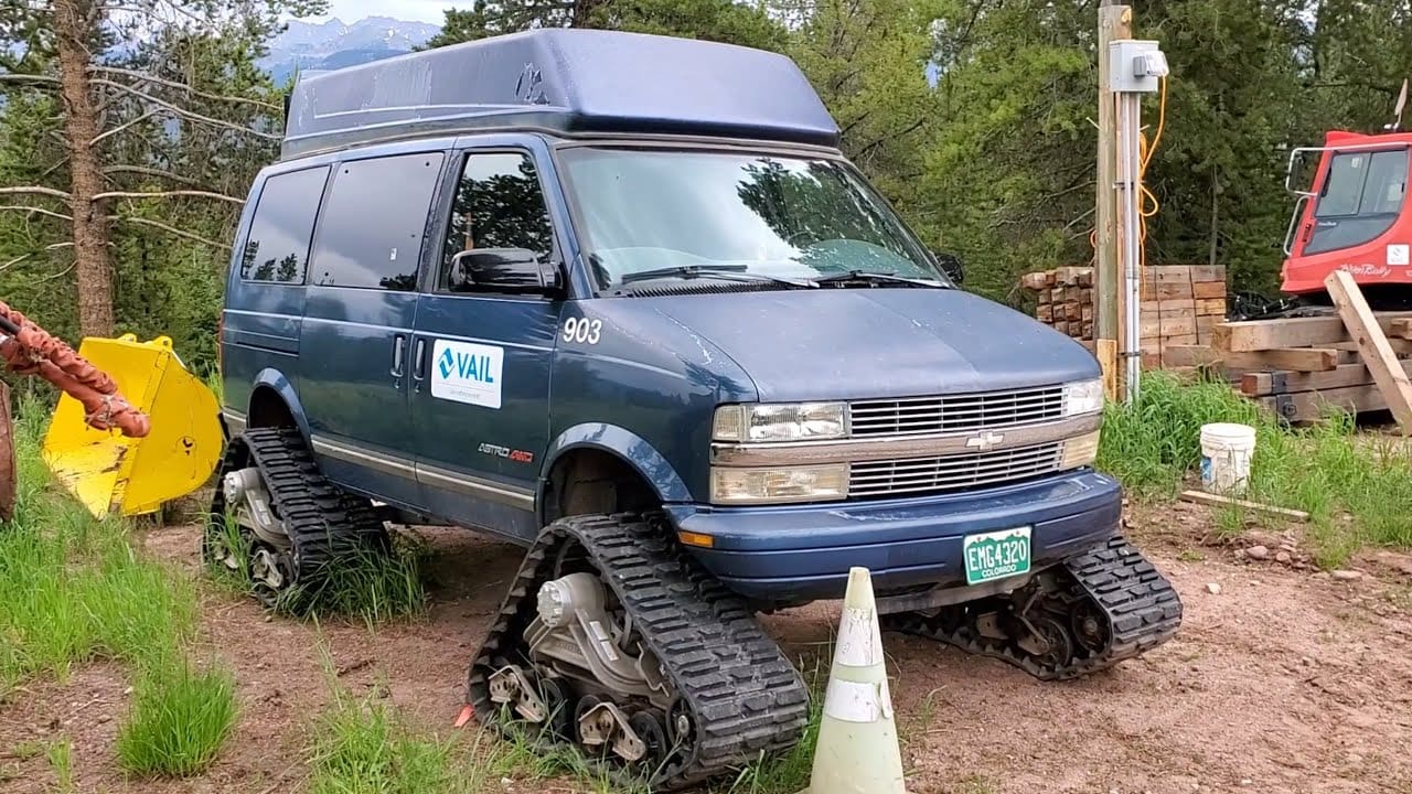 What’s The Deal With The Astro Van With Snow Treads On Top of VAIL?