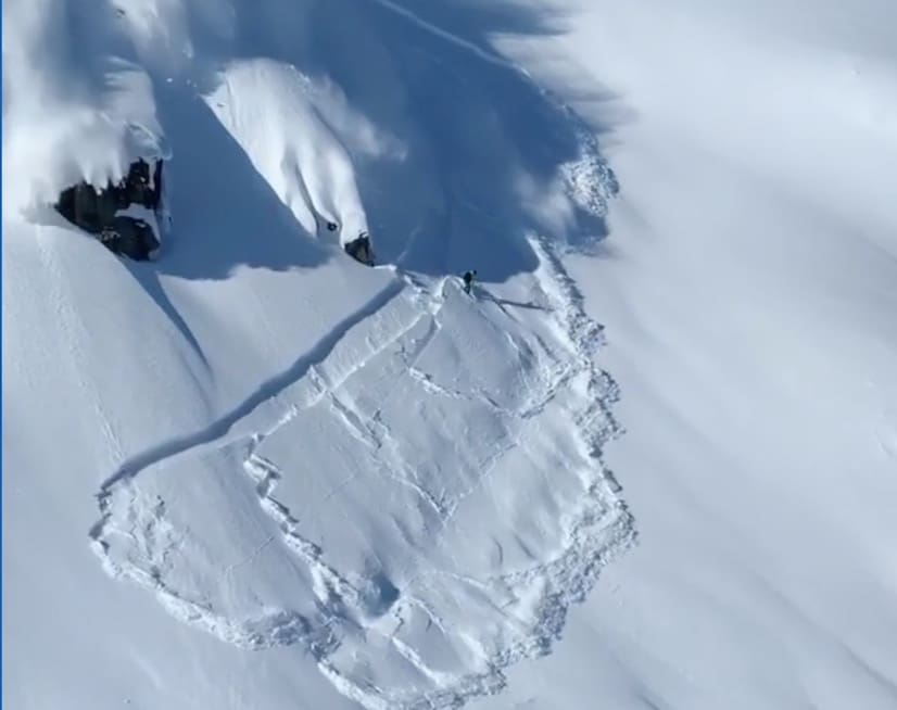 VIDEO: Snowboarder Lands Cliff Directly Into Fracturing Avalanche