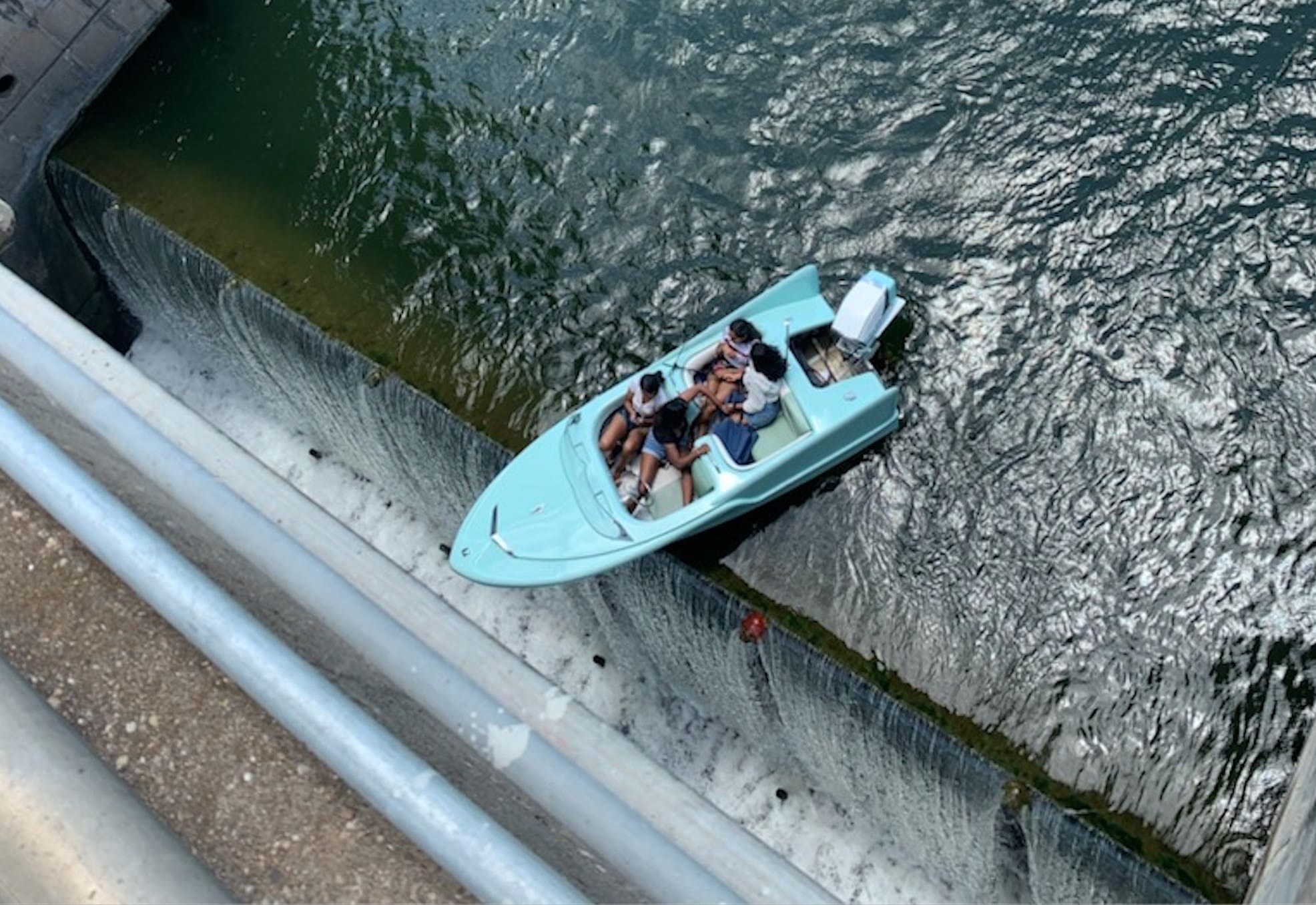 VIDEO: 4 Women In Rental Boat Rescued Hanging Over 36ft Texas Dam