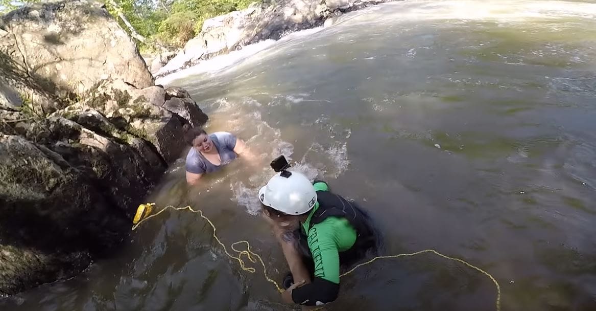 Kayakers Rescue Man Swimming Above Dangerous Rapids, Waterfall