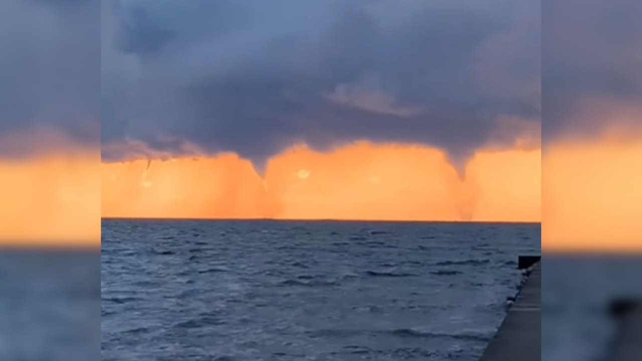 Several Waterspouts Captured During Amazing Sunset