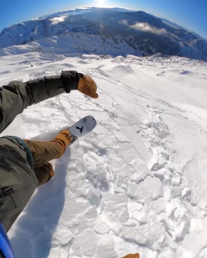 VIDEO: Snowboarder Triggers Avalanche While Riding Convex Roll