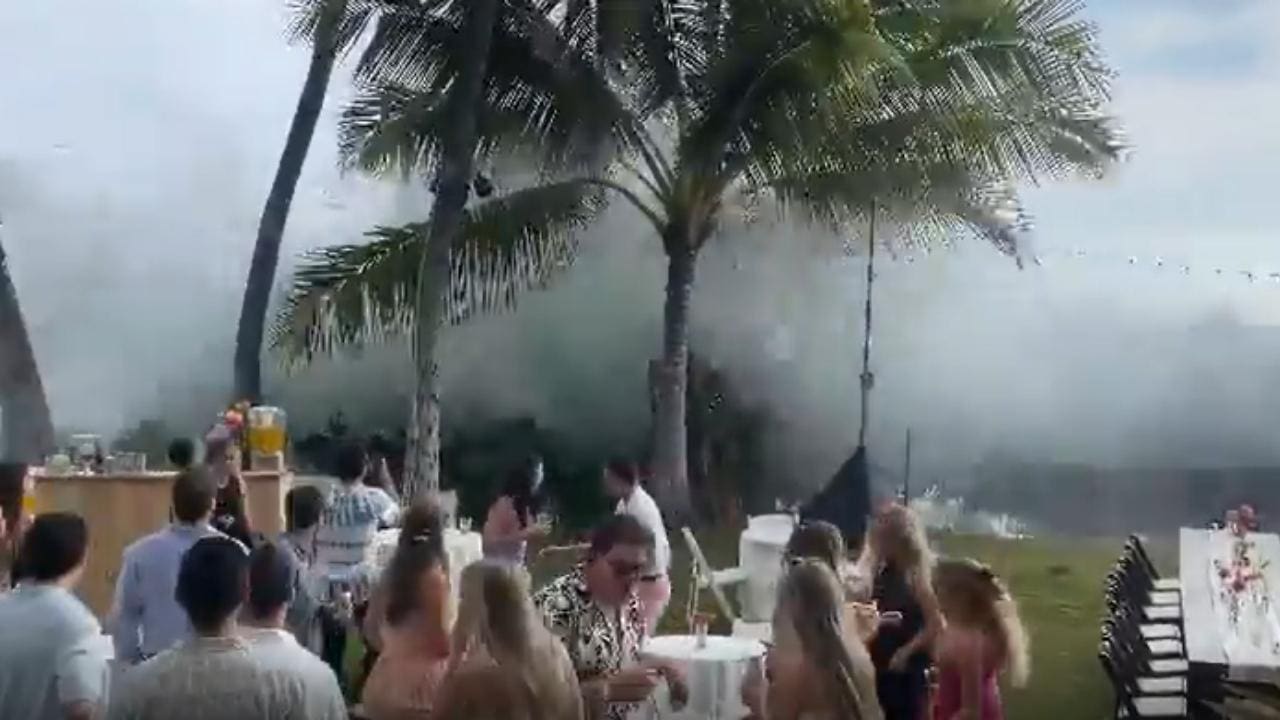 WATCH: Huge Waves Crash Hawaiian Wedding