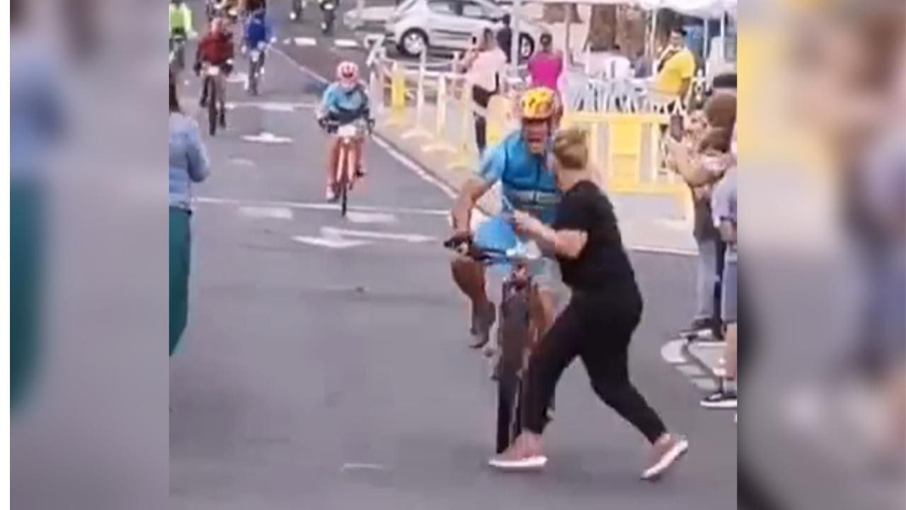 Cyclist Slams Into Ignorant Spectator At Finish Line (Watch)