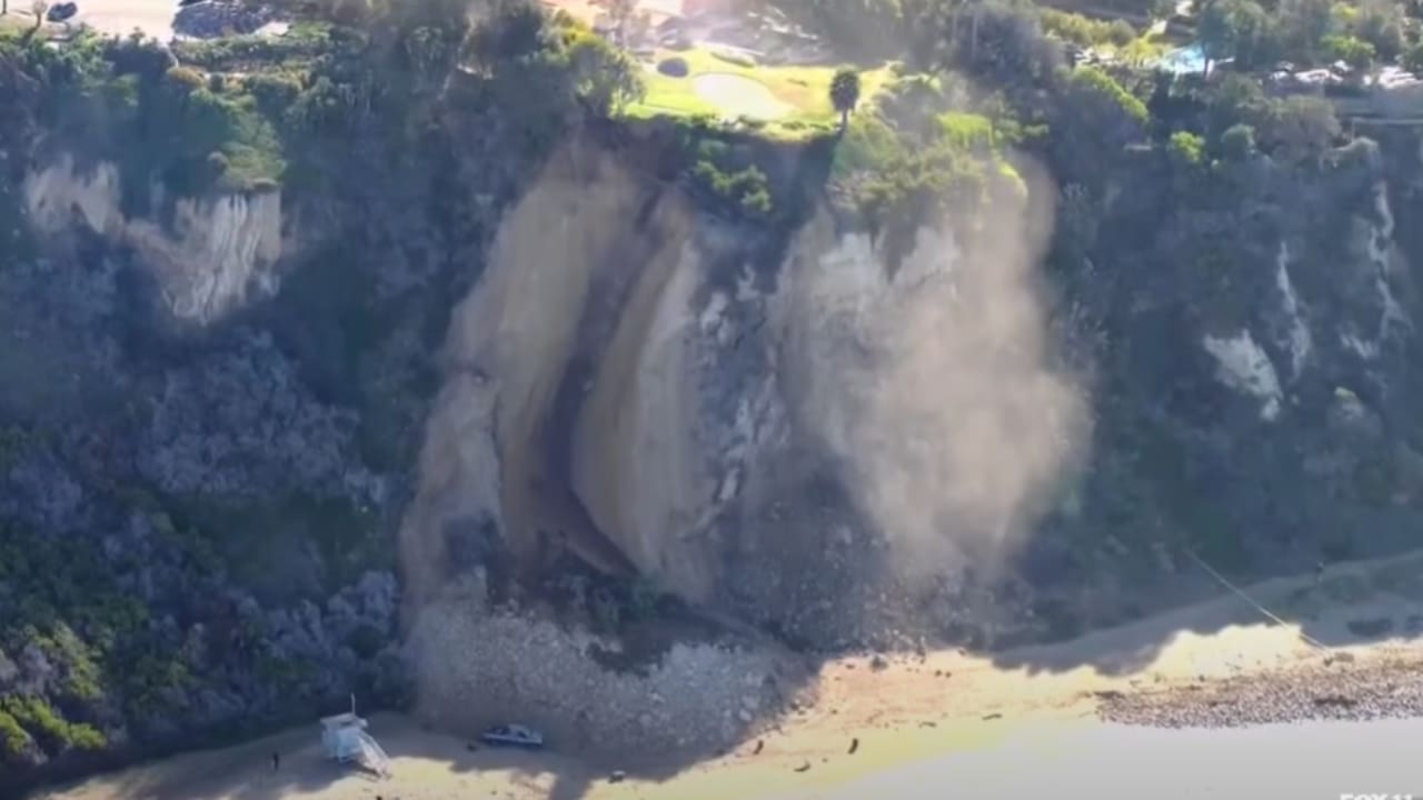 WATCH: Towering Cliff Collapses On Popular Beach