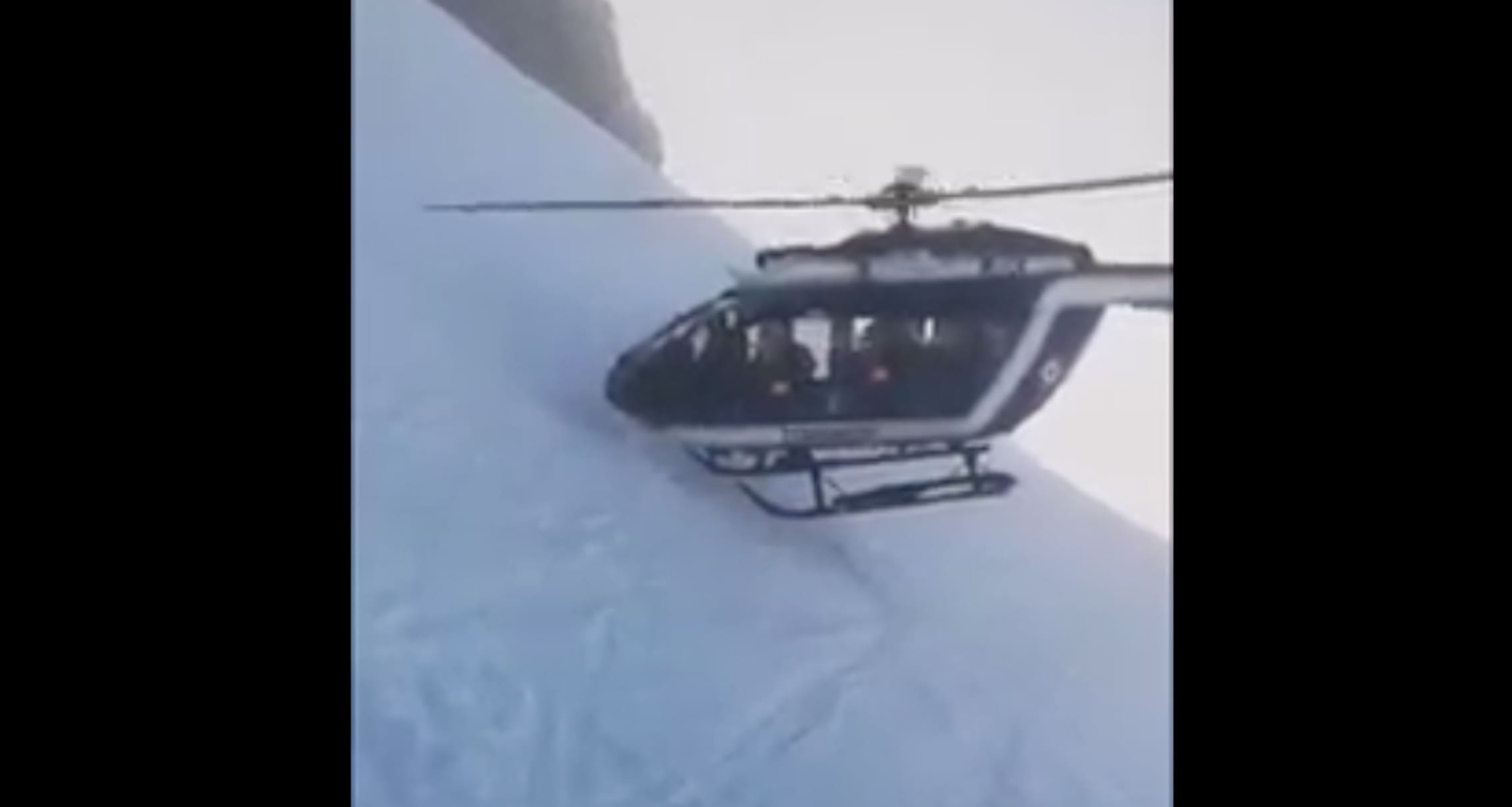 VIDEO: Badass Helicopter Pilot Rescues Injured Skier With Rotors Inches ...