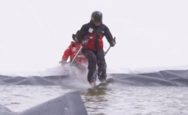 WATCH: Ski Patroller Sends Ponds Skim With Loaded Sled