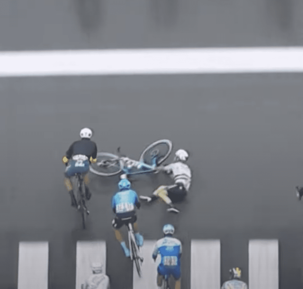 Cyclist Slides Across Finish Line After Last Minute Crash